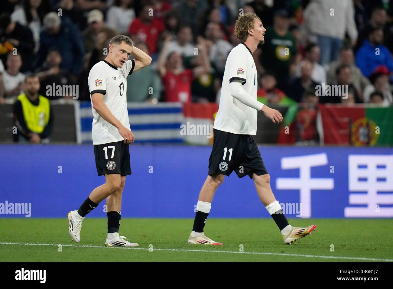 Germany's Florian Wirtz, left, celebrates with Nick Woltemade after ...