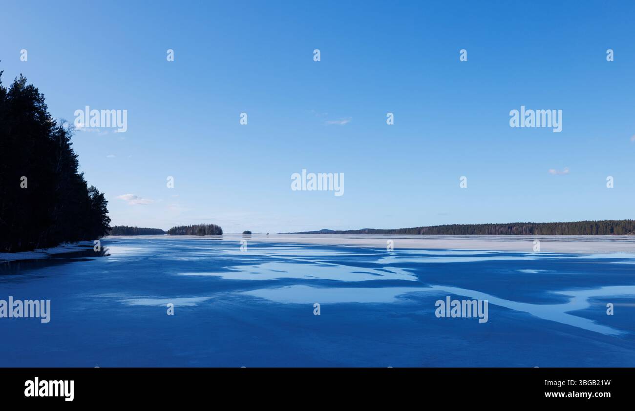 Ice starting to melt at Lake Iisvesi at Spring, Finland Stock Photo - Alamy