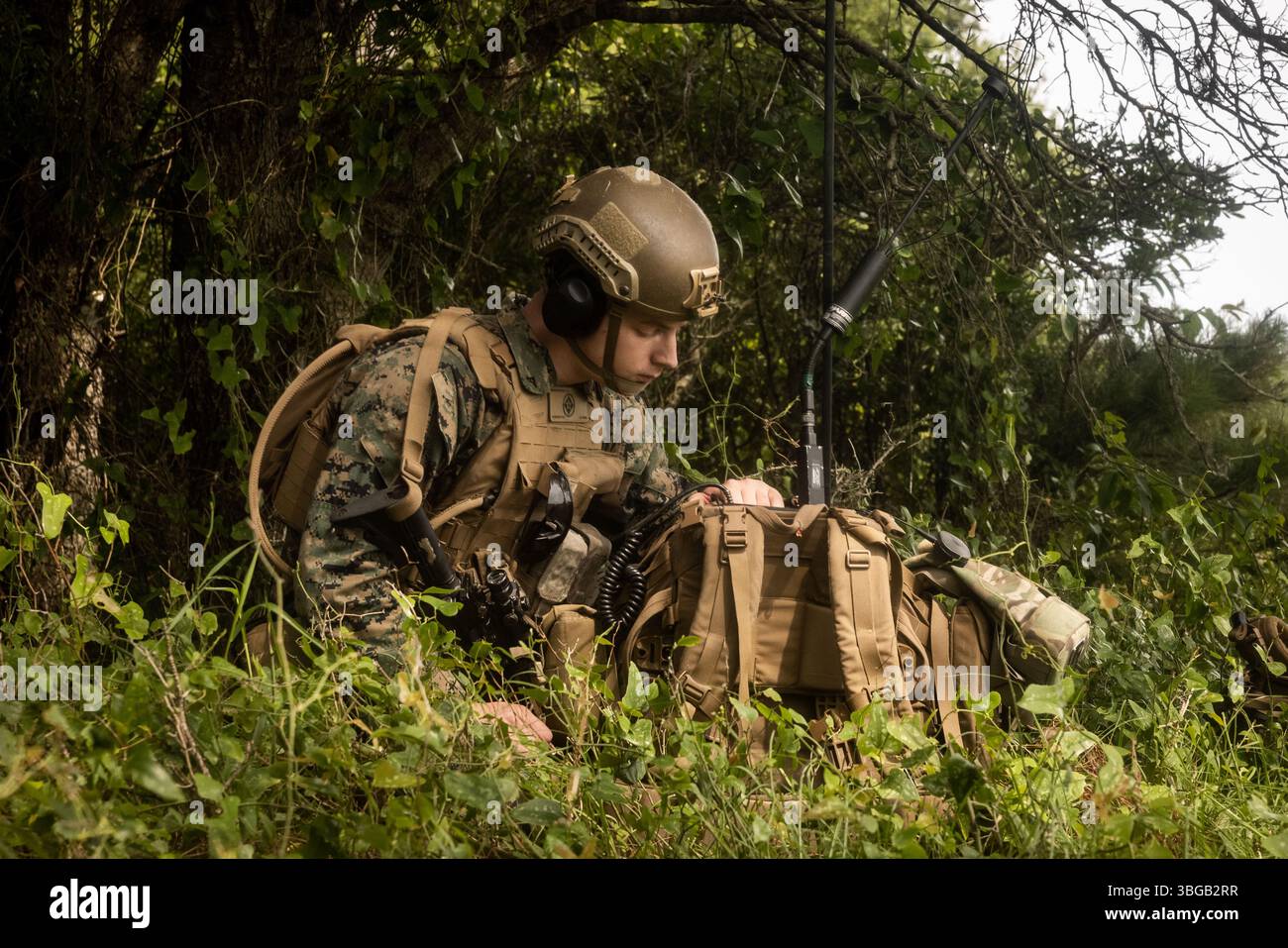 U.S. Marine Corps Lance Cpl. Cooper Magnuson, a transmissions system ...