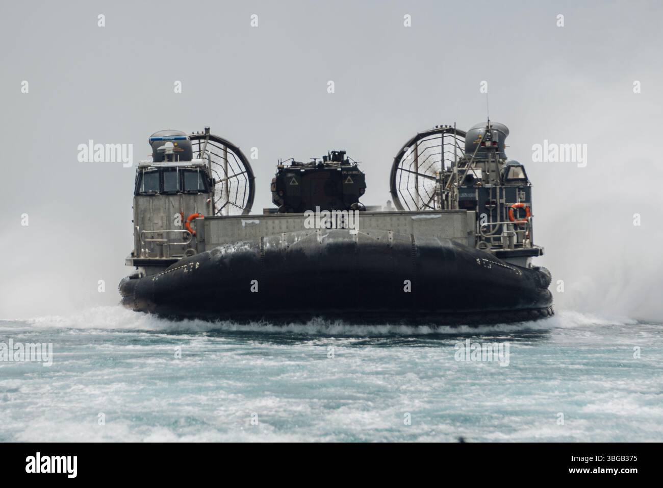 U.S. Navy Landing Craft, Air Cushion 58 attached to Assault Craft Unit ...