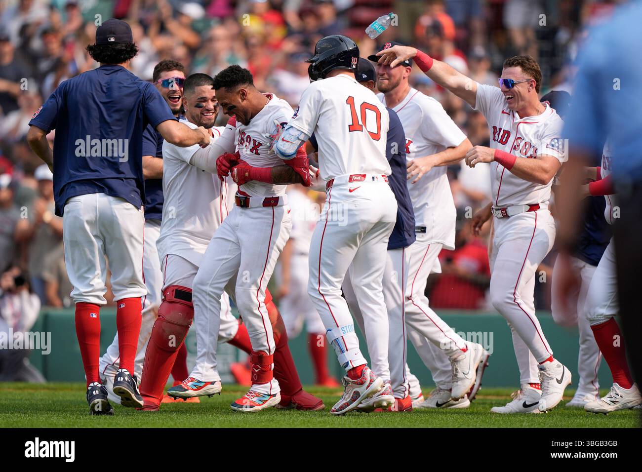 Boston Red Sox players celebrate a walk off home run by Ceddanne ...