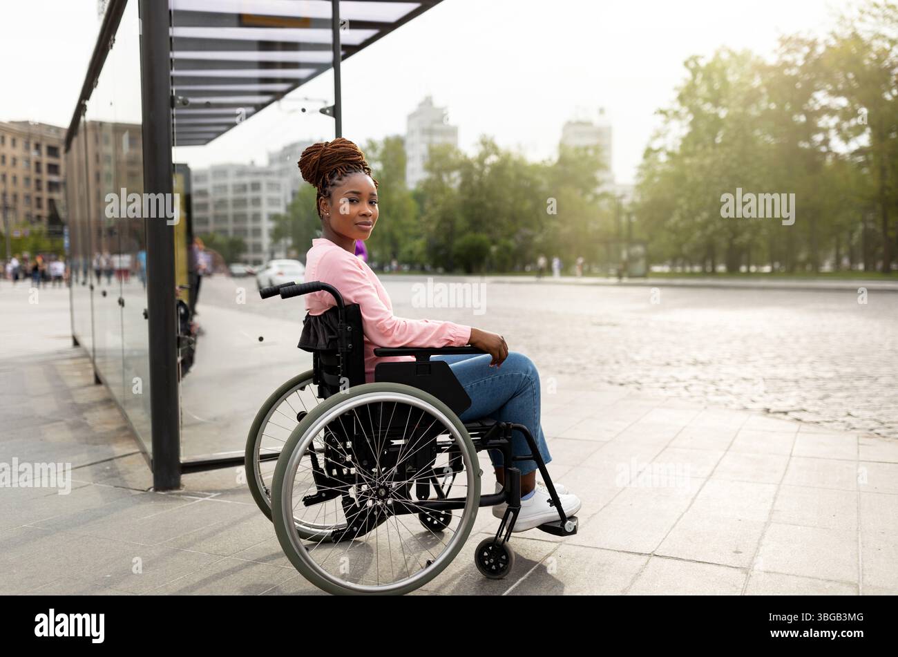 Young black handicapped woman in wheelchair cannot board vehicle ...