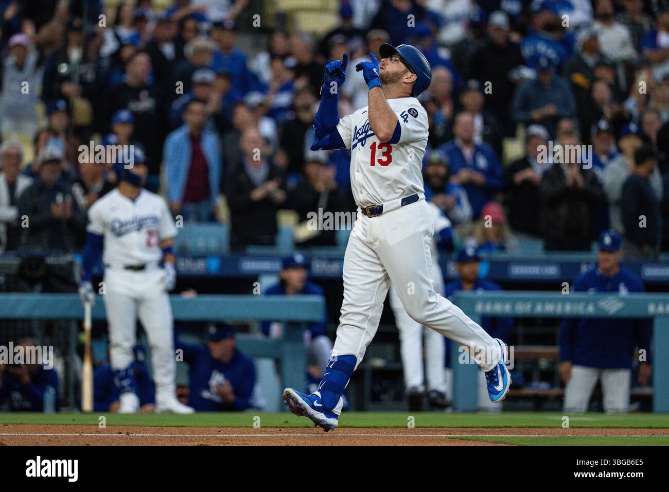 Los Angeles Dodgers third base Max Muncy (13) celebrates after hitting ...