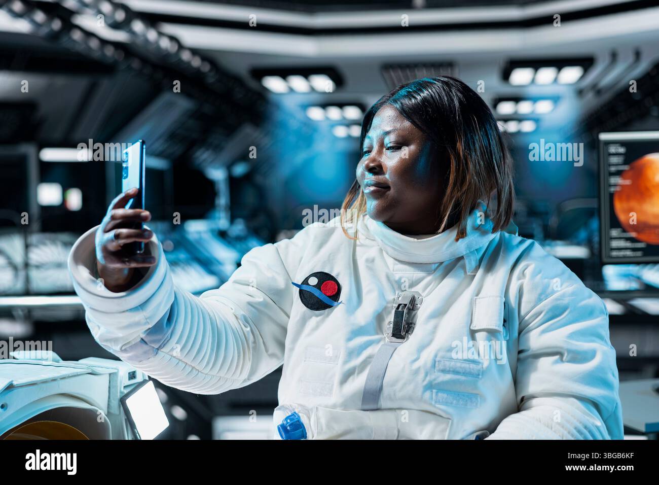 Female astronaut doing videocall, talking with family, presenting space ...