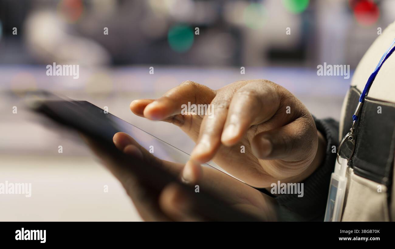 Close up of engineer in industry 4.0 plant designing robotic production ...