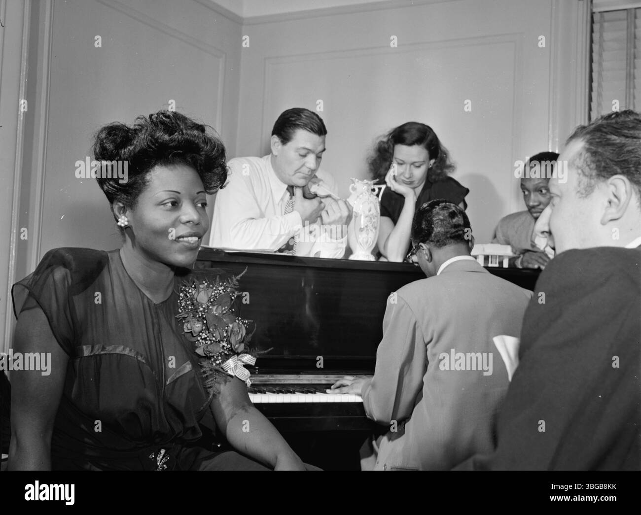 Mary Lou Williams in her New York apartment with a group of jazz greats ...