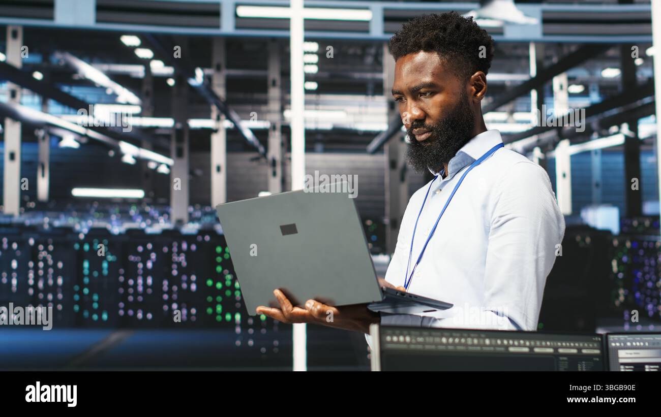 Data center programmer uses node tree software to identify equipment performance issues. African ...