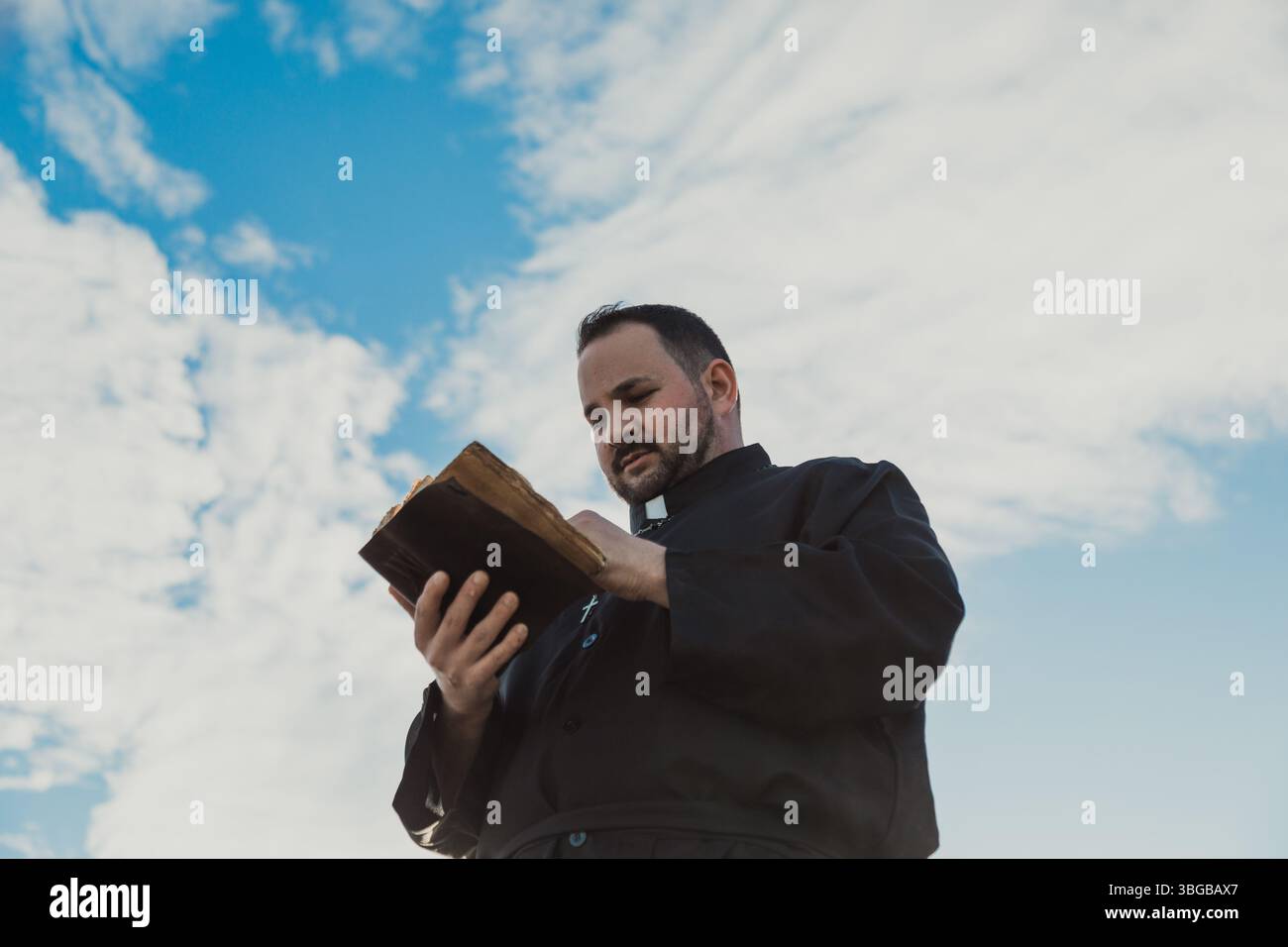 Praying deacon hi-res stock photography and images - Alamy
