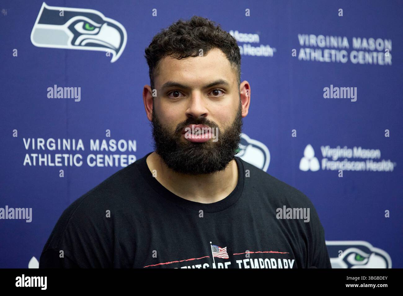 Seattle Seahawks offensive tackle Abraham Lucas talks to the news media after an NFL football ...