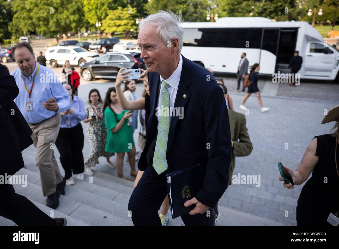 Sen. Ron Johnson (R-Wis.) is pursued by reporters outside the U.S ...