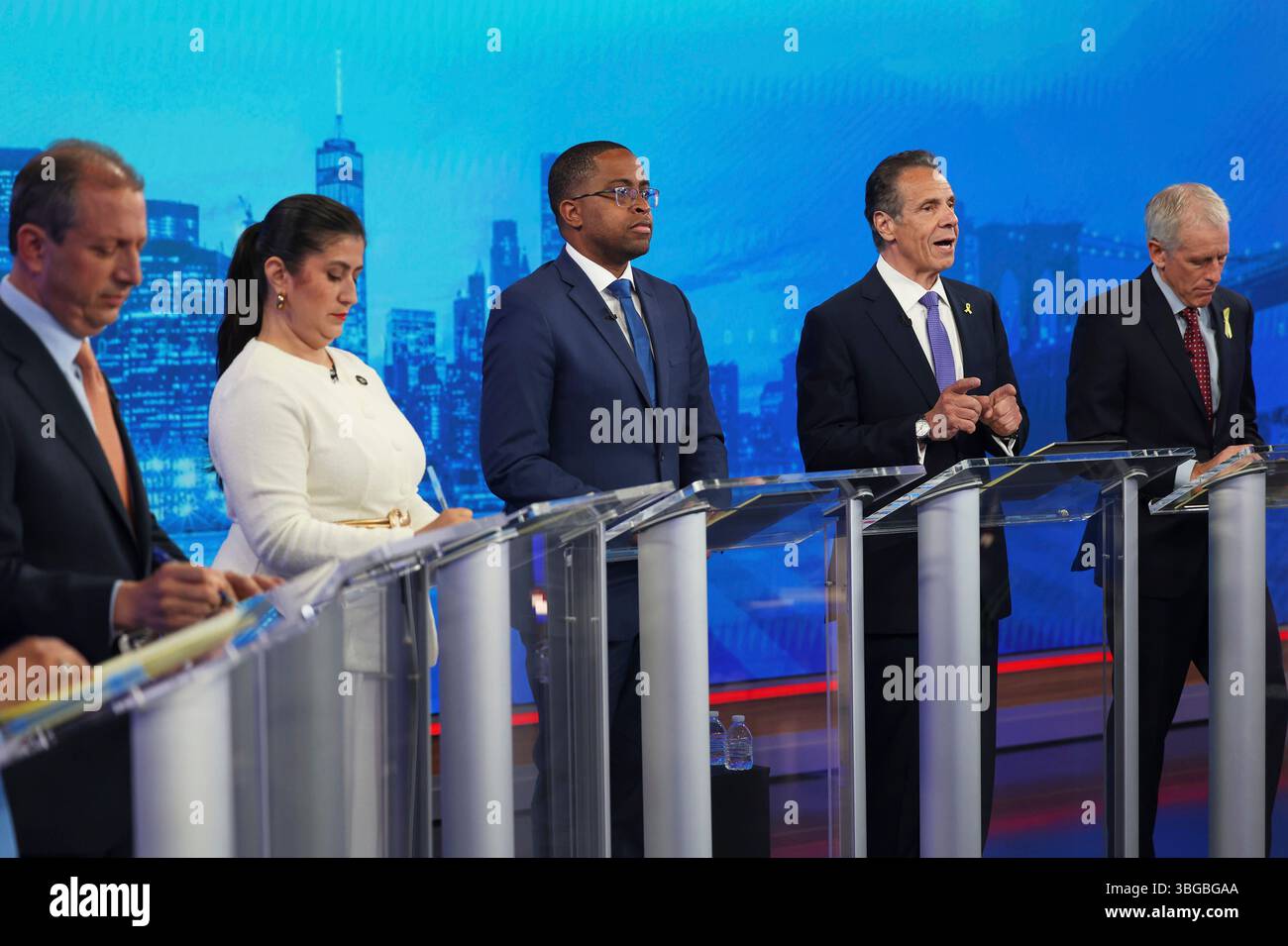 Andrew Cuomo, second from right, speaks during a Democratic mayoral ...