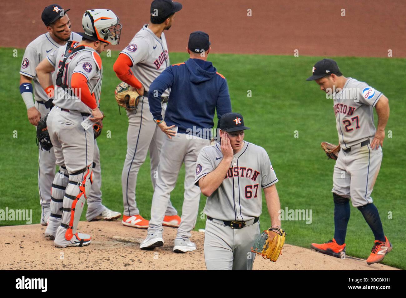Houston Astros pitcher Ryan Gusto (67) walks to the dugout after ...