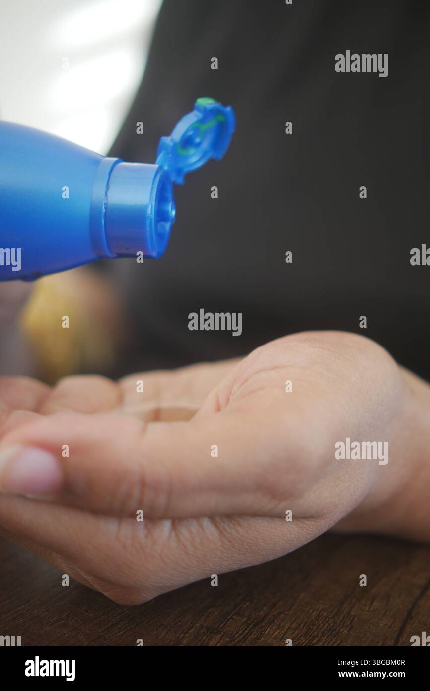 Applying nourishing oil serum hi-res stock photography and images - Alamy