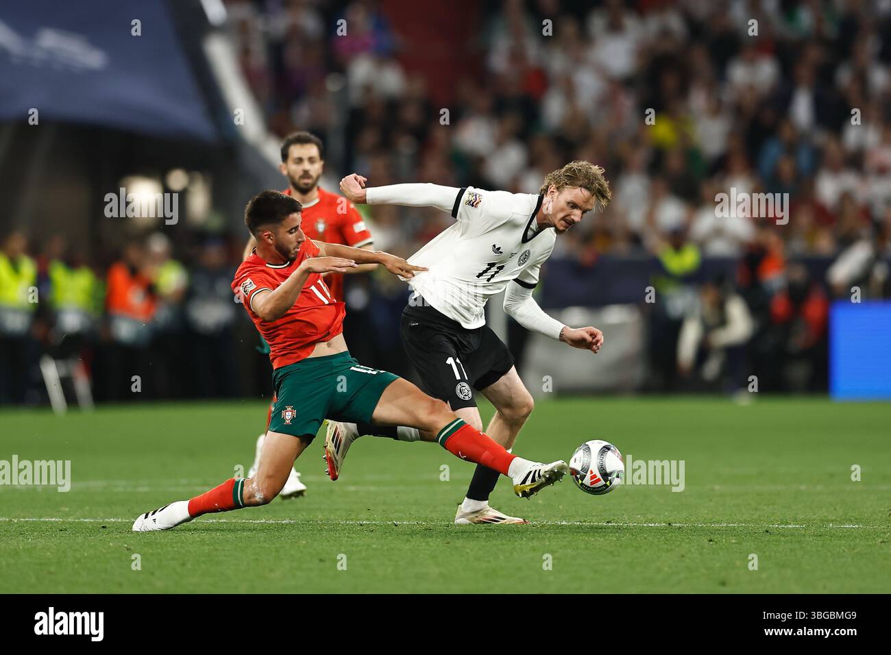Munich, Germany. 4th June, 2025. (L-R) Goncalo Inacio (POR), Nick ...