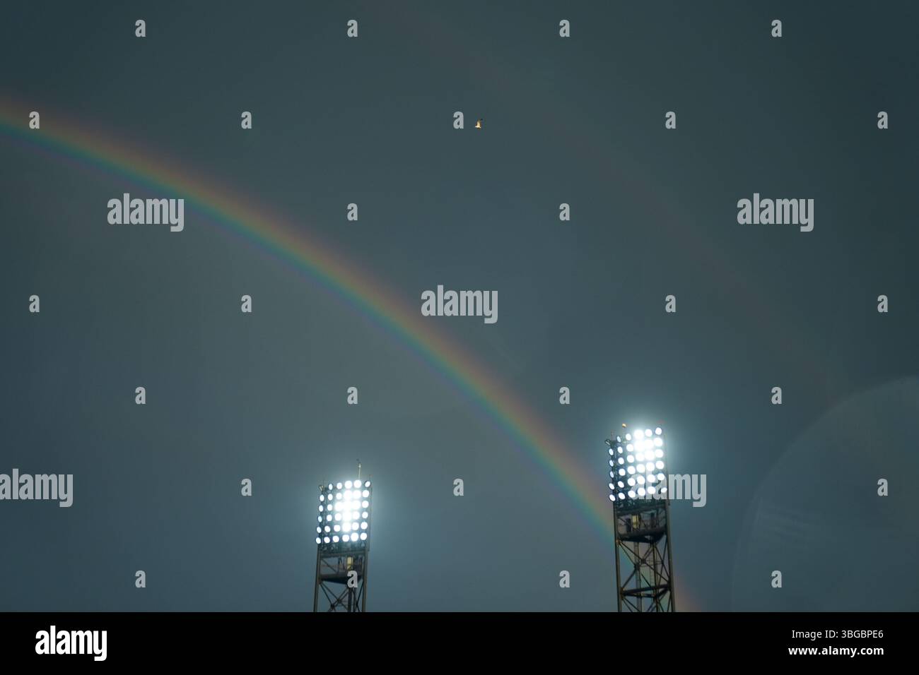 A double rainbow forms over Rate Field during a rain delay before a ...