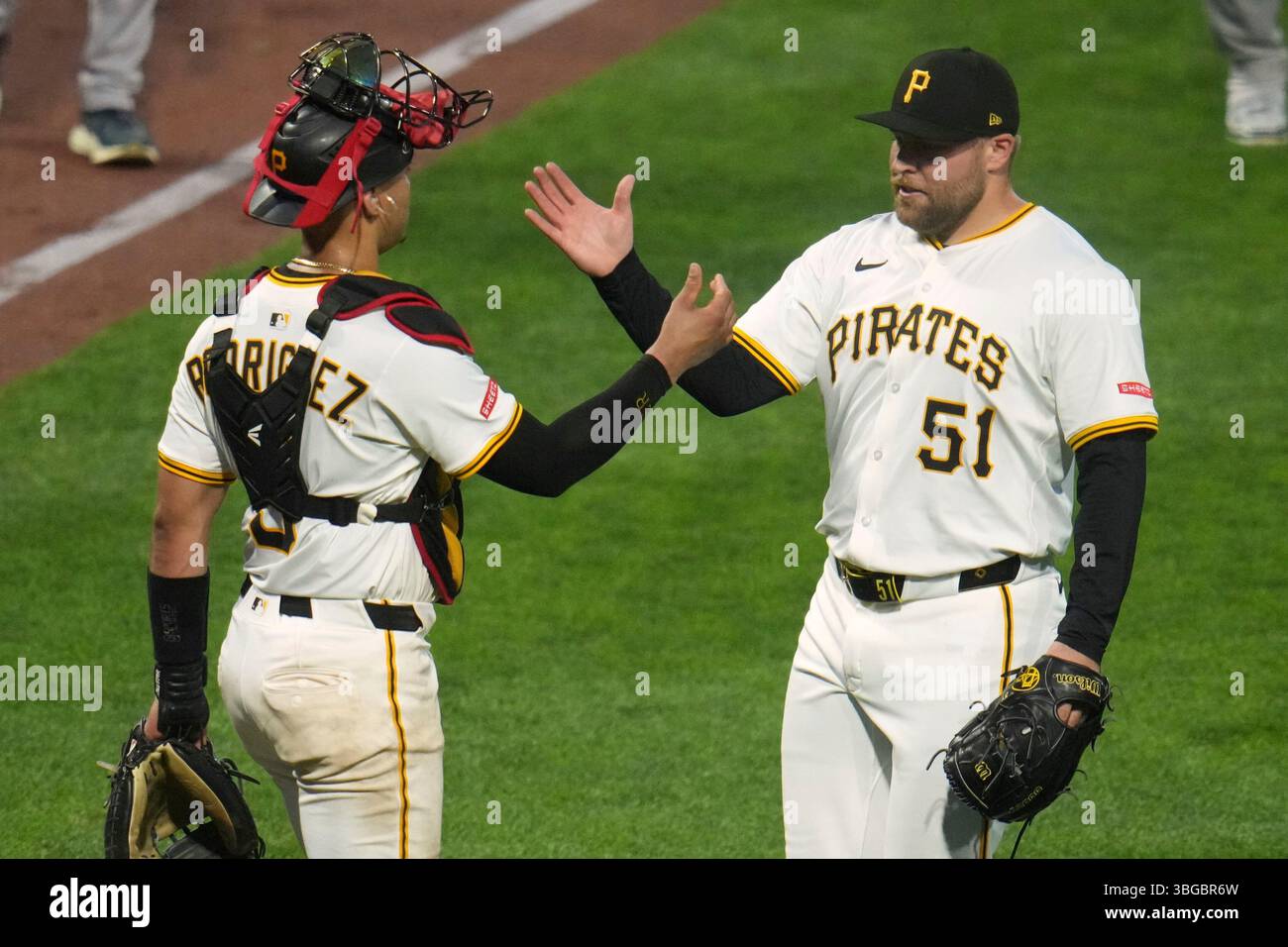 Pittsburgh Pirates pitcher David Bednar (51) celebrates with catcher ...