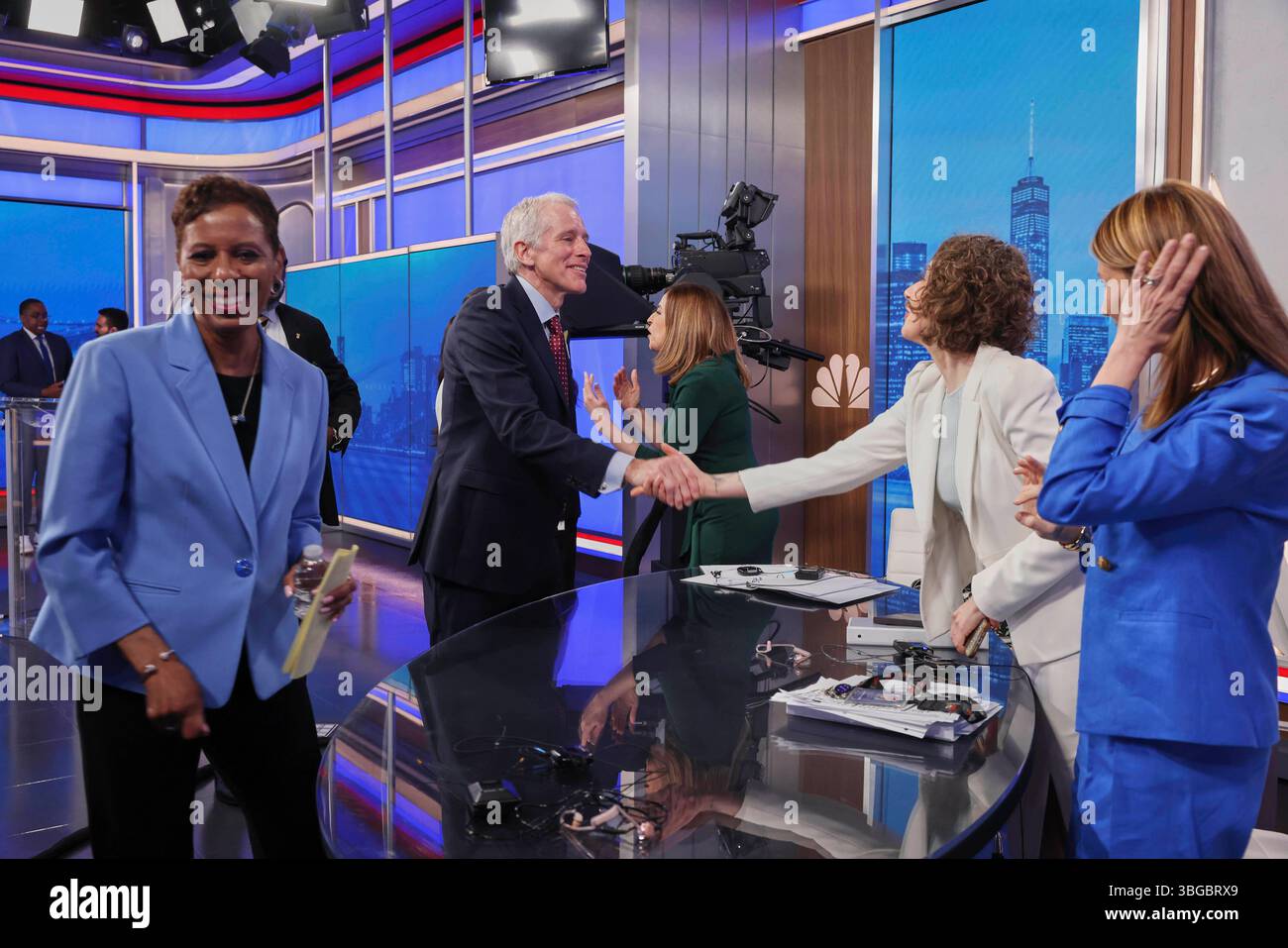 Democratic mayoral candidates Whitney Tilson, center, and Adrienne ...