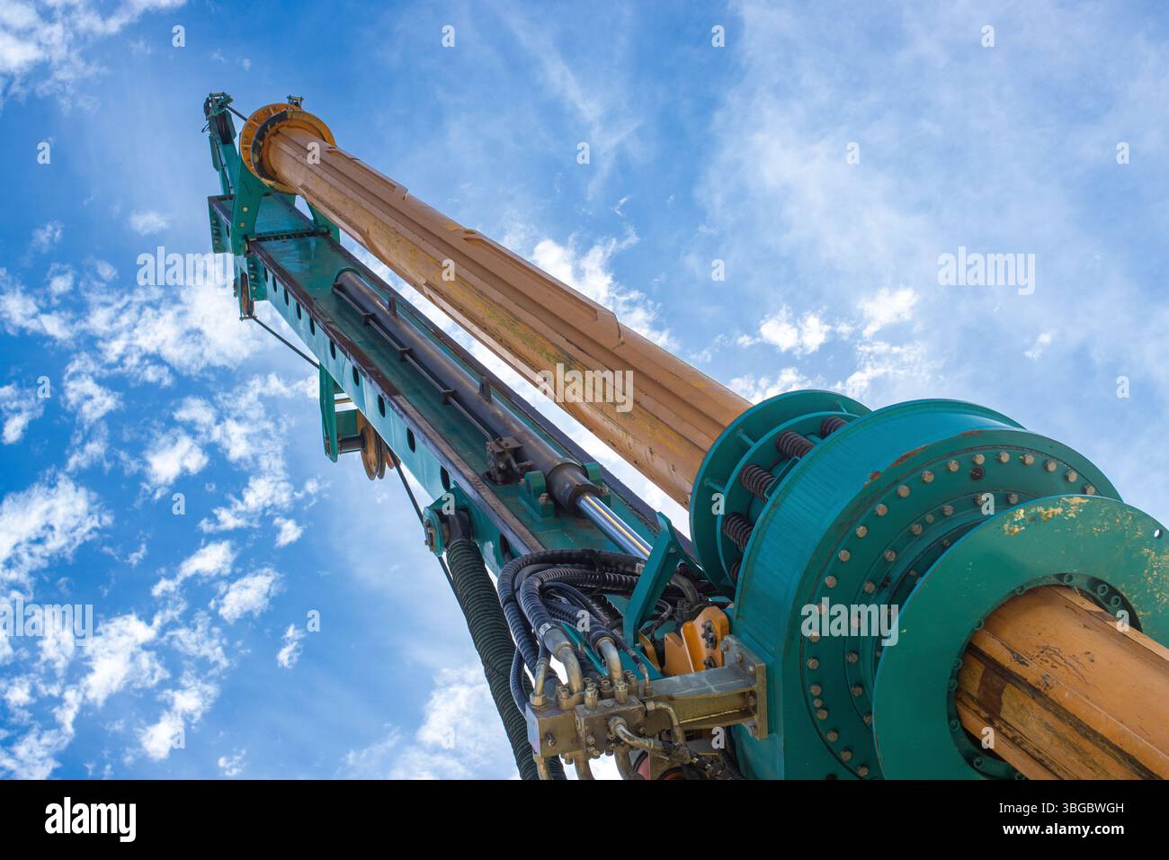 Excavator boom and hydraulic system, for drilling vertical and inclined ...