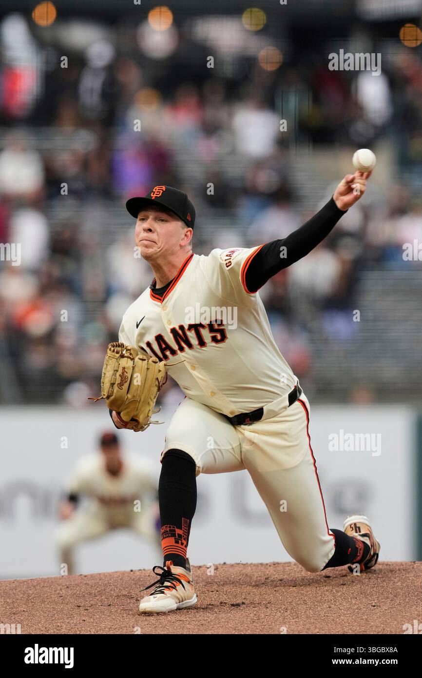 San Francisco Giants pitcher Kyle Harrison throws to a San Diego Padres ...