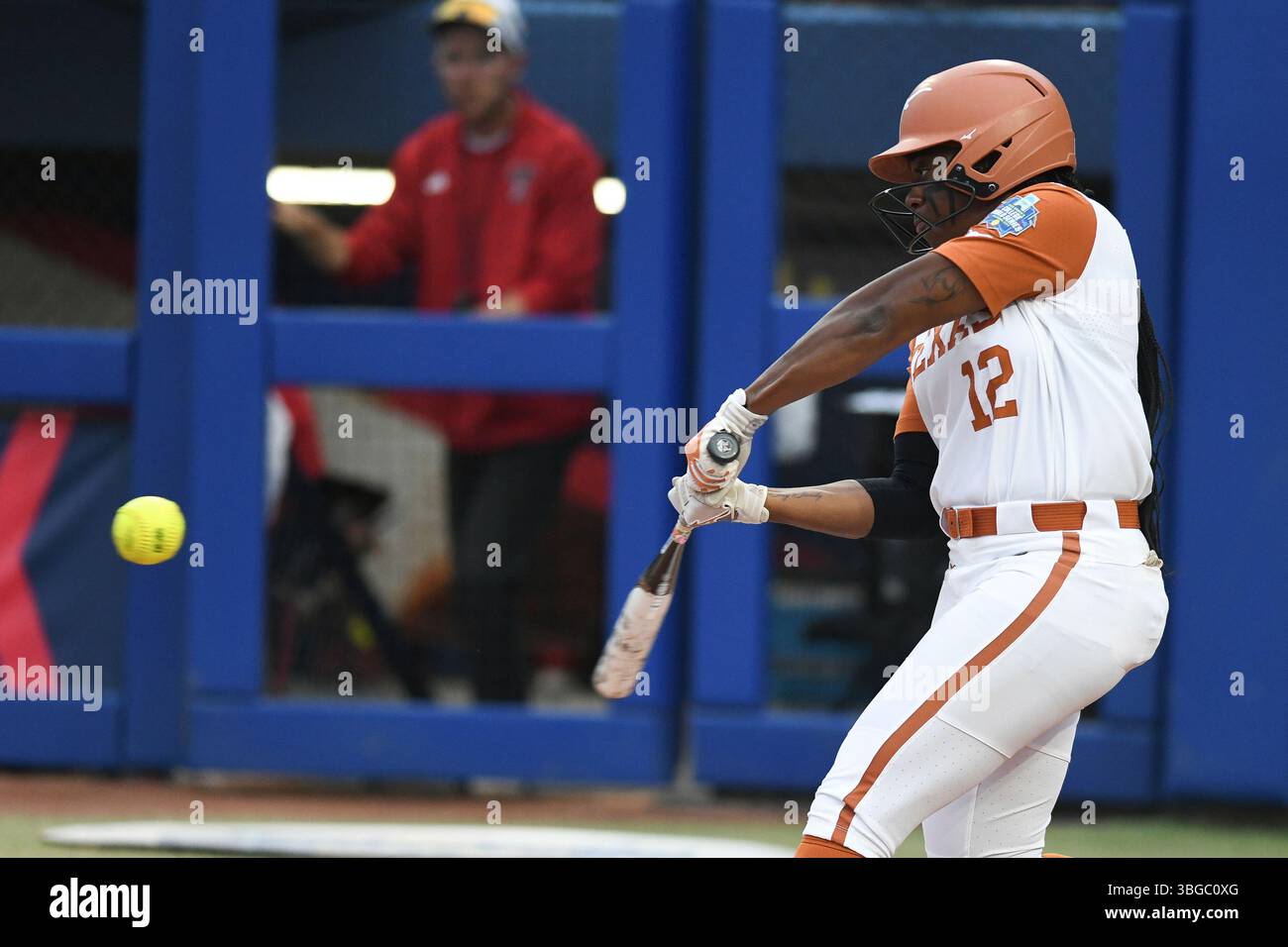 Texas' Victoria Hunter connects with the ball during the first game of ...