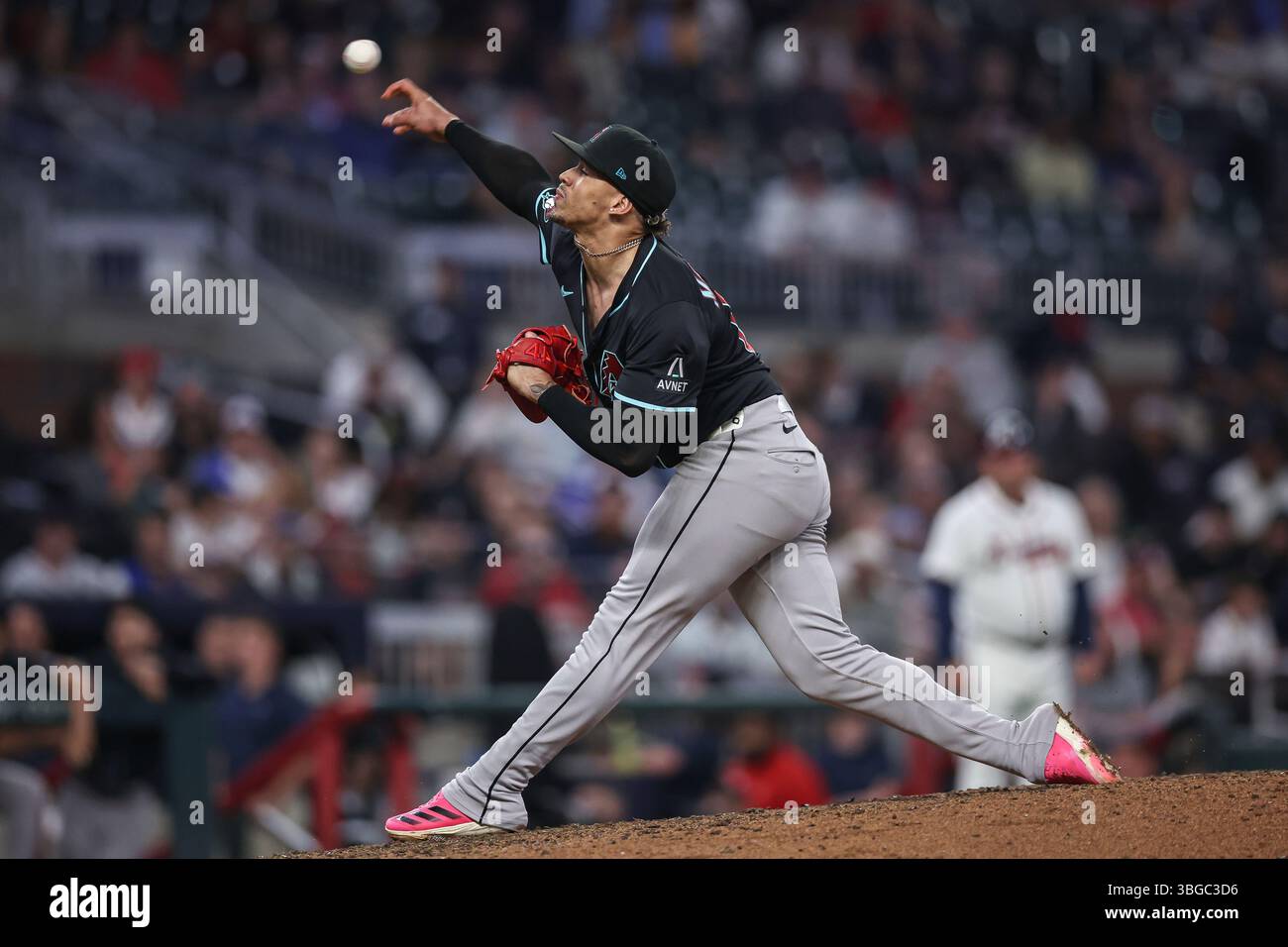 Arizona Diamondbacks pitcher Justin Martinez delivers in the ninth ...