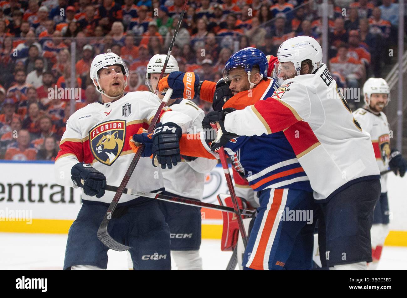 Florida Panthers' Aaron Ekblad (right) and Edmonton Oilers' Evander ...