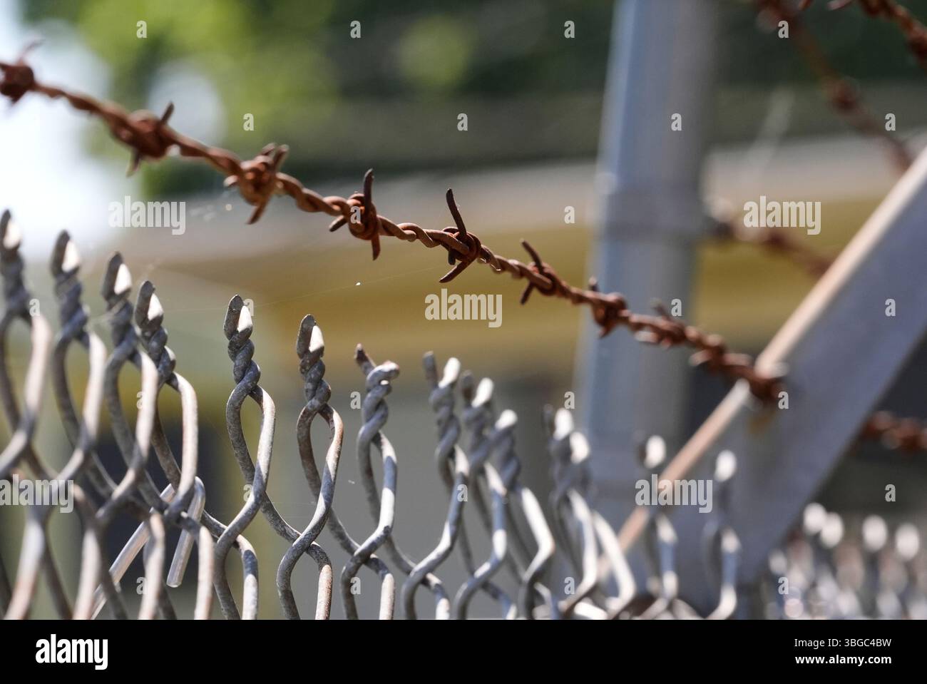 Barbed wire is seen at the gates of Ferriday High School in Ferriday ...