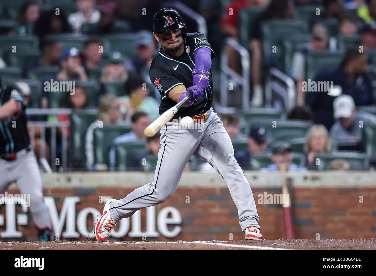 Arizona Diamondbacks' Gabriel Moreno hits an infield single in the ...