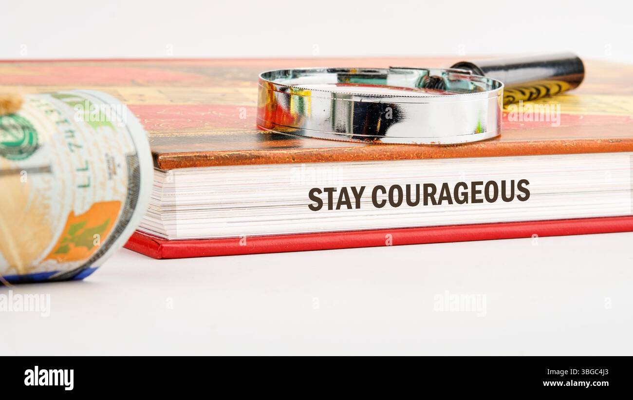 Business motivational quotes STAY COURAGEOUS Stock Photo - Alamy