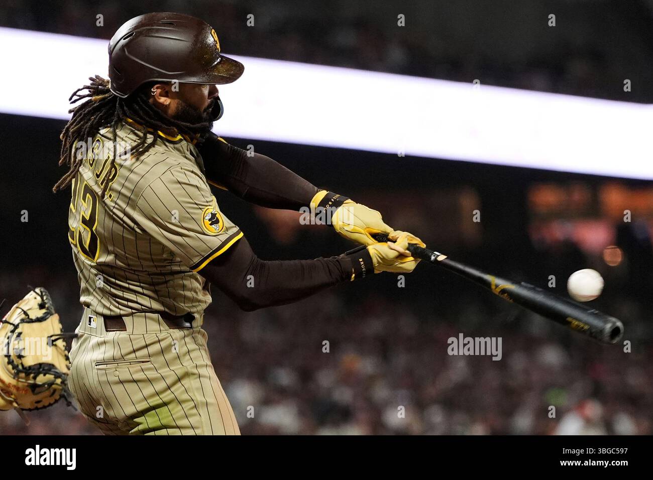 San Diego Padres' Fernando Tatis Jr. hits a single during the ninth ...