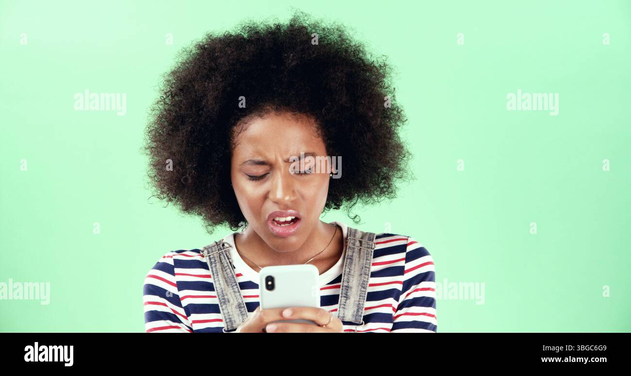 Green screen, disappointed and black woman with phone for breaking news ...