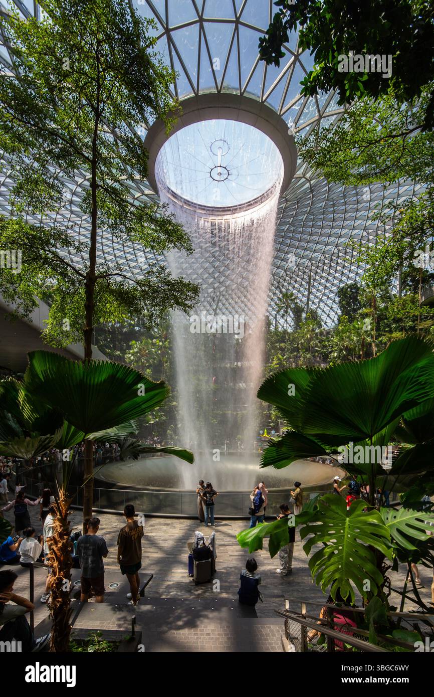 Vertical view of rain vortex architecture, indoor cascading waterfall ...