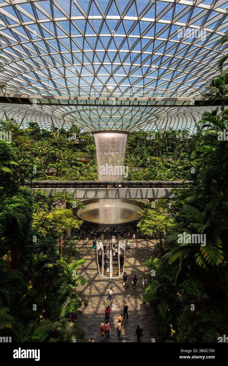 Step into Jewel Changi Airport, Singapore, witness the Rain Vortex, a ...