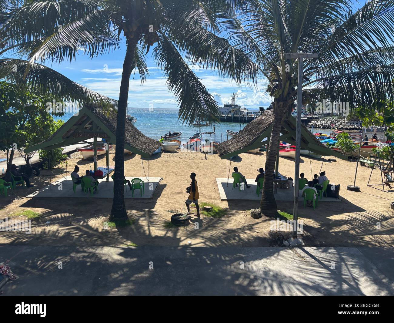 Tables on beach out the front of the Point Cruz Yacht Club, Honiara ...