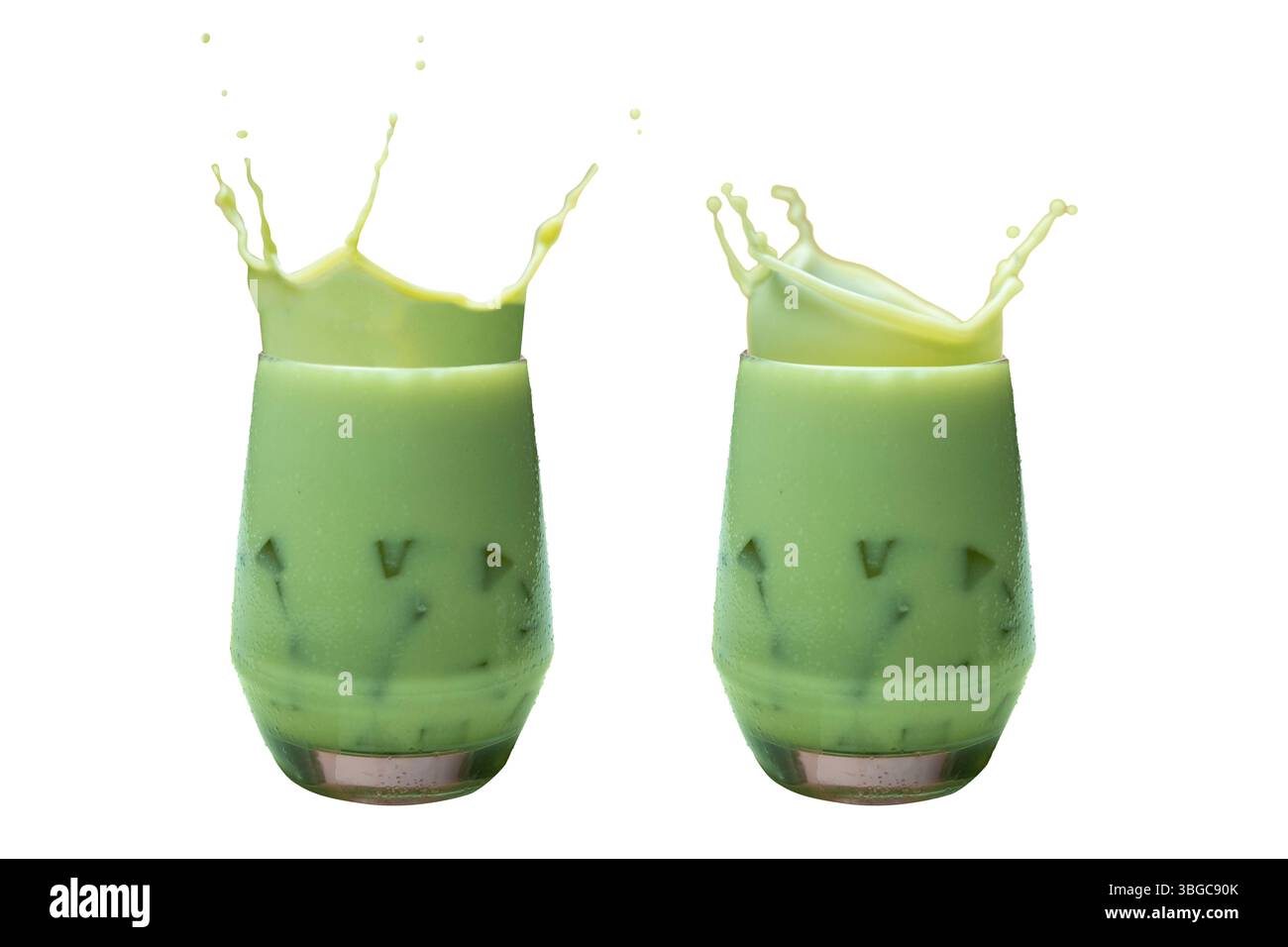 Two iced matcha green tea in a glass with a splash isolated over a ...