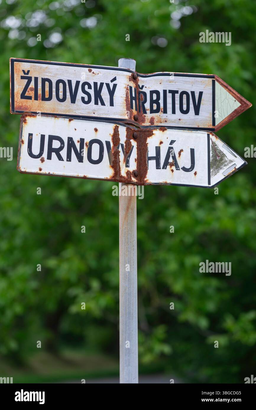 Vintage directional sign showing Jewish cemetery and urn grove, with ...