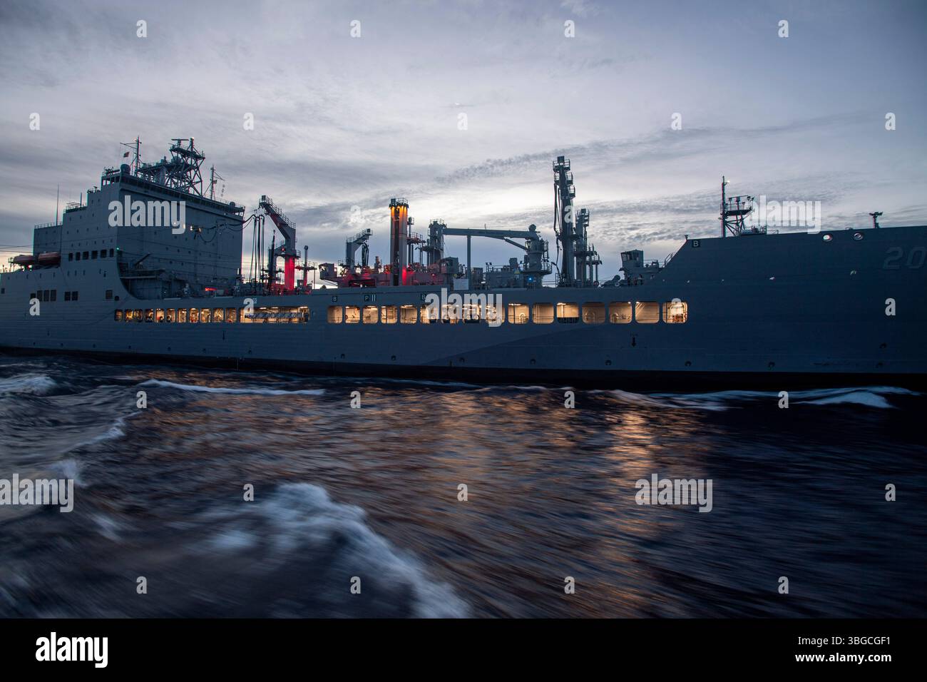 The fleet replenishment oiler USNS John Lewis (T-AO 205) sails ...