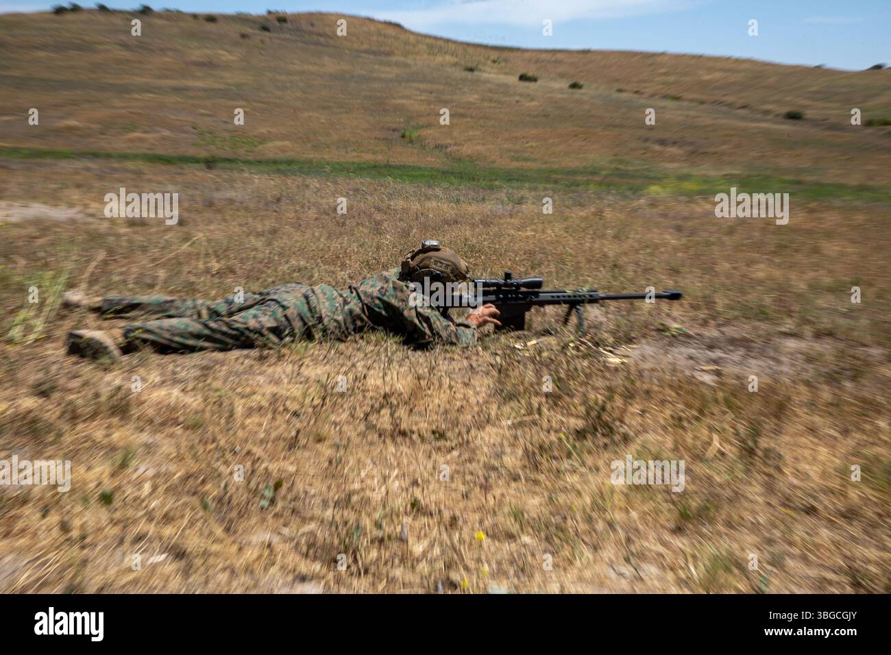A U.S. Marine with 1st Reconnaissance Battalion, 1st Marine Division ...