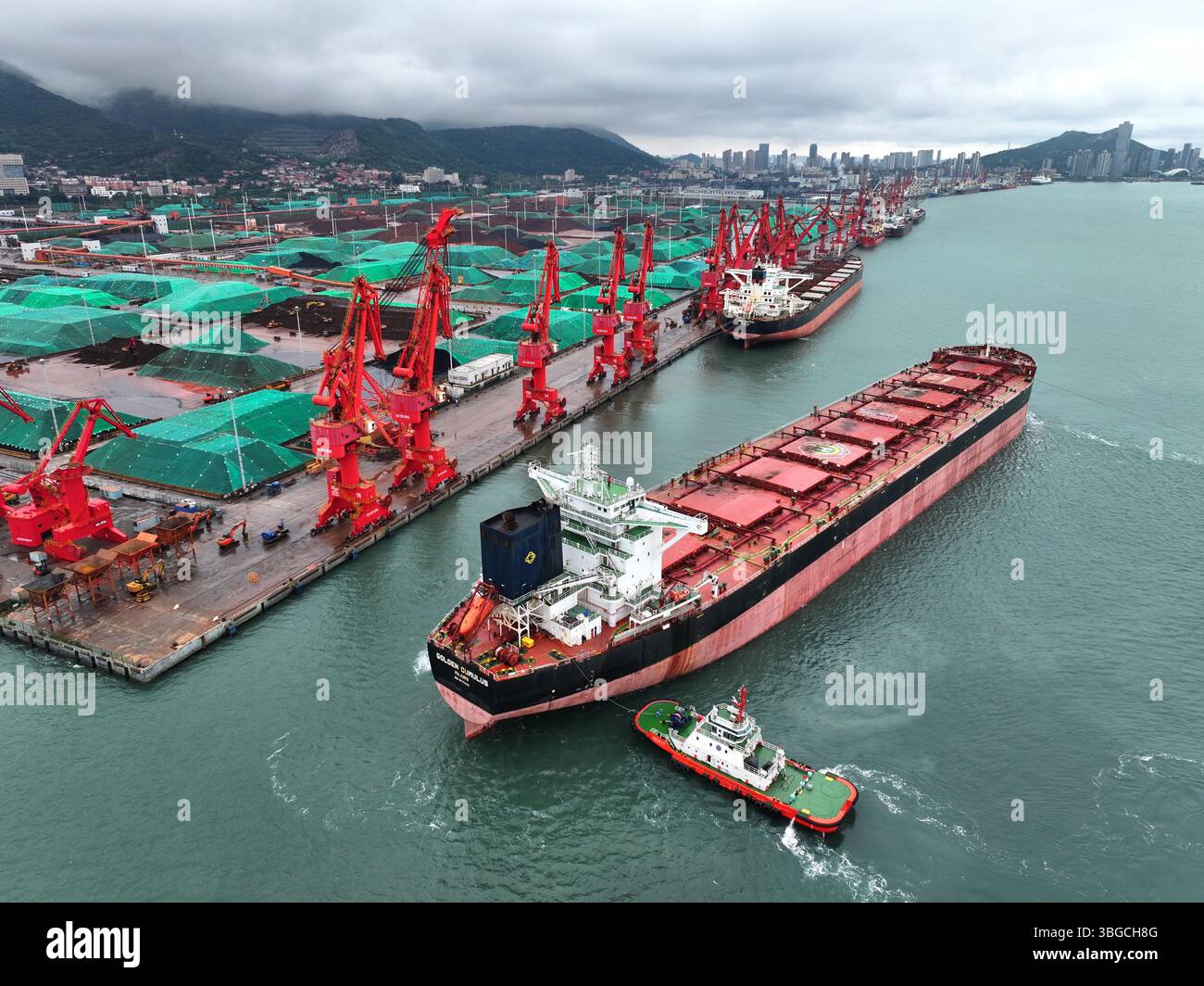 Aerial photo shows the ship unloading coals at Lianyungang Port in ...