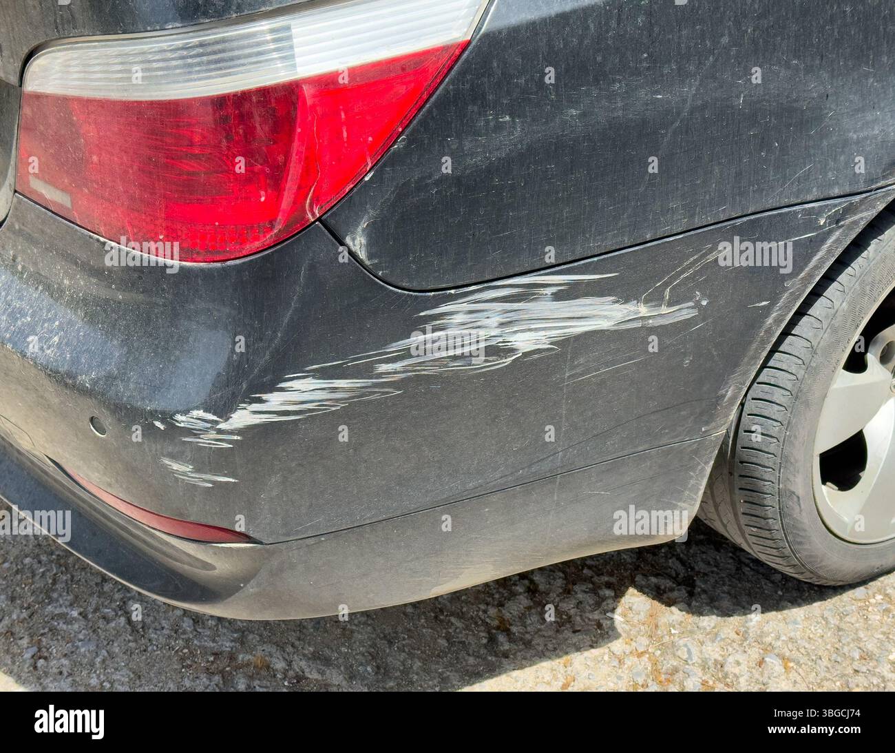 Paint damage scratches on a black car Stock Photo - Alamy