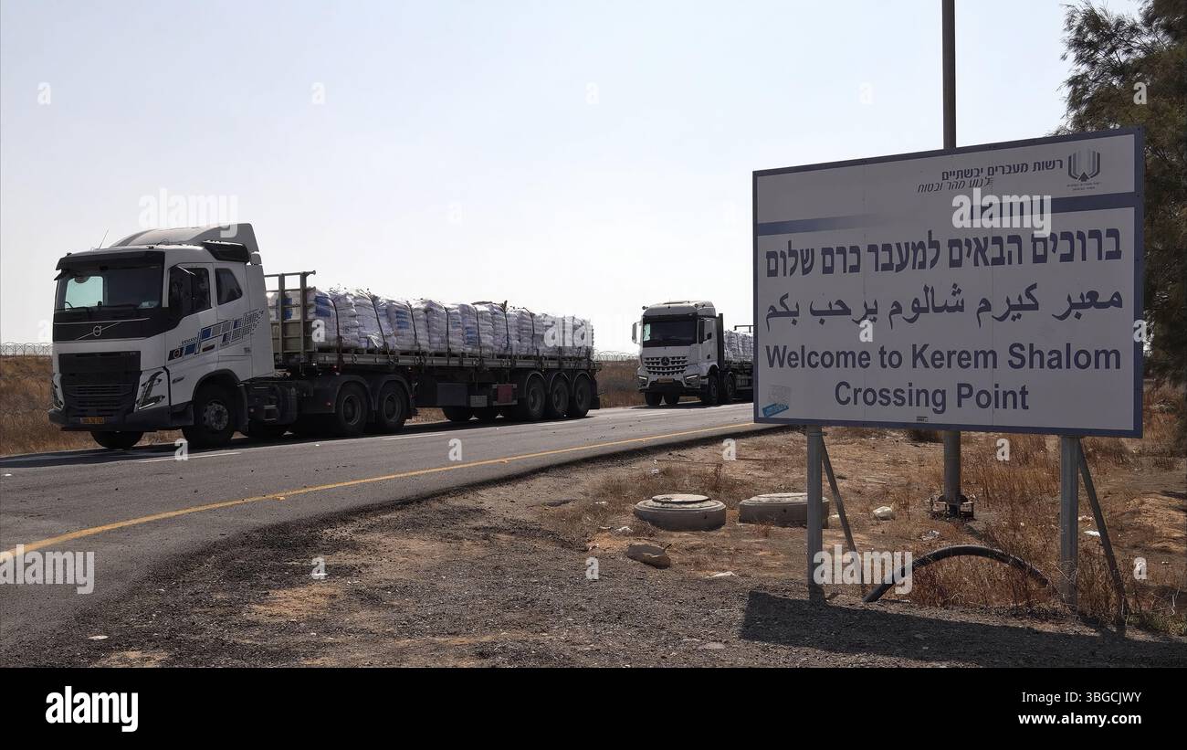 GAZA BORDER, ISRAEL - JUNE 4: Trucks carrying humanitarian aid wait to ...