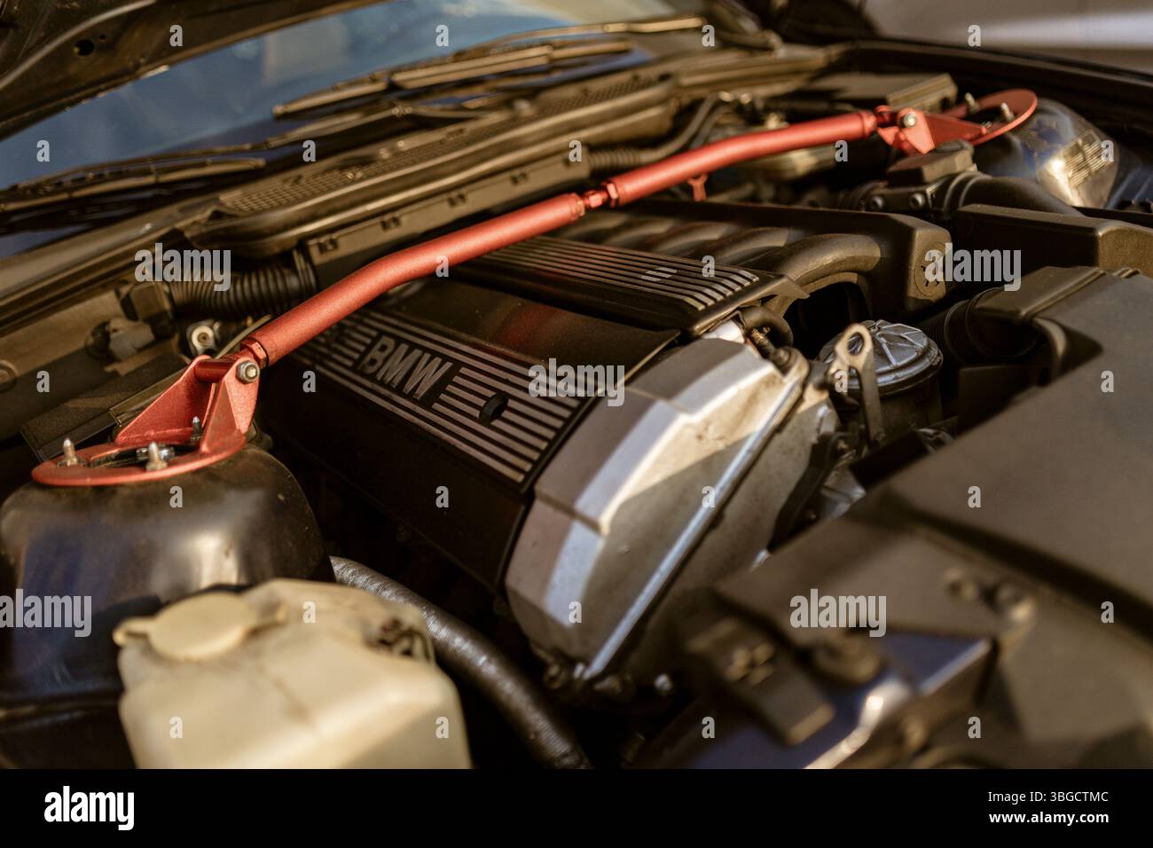 Milan, italy 4 june 2025, close up of a modified bmw engine featuring a ...