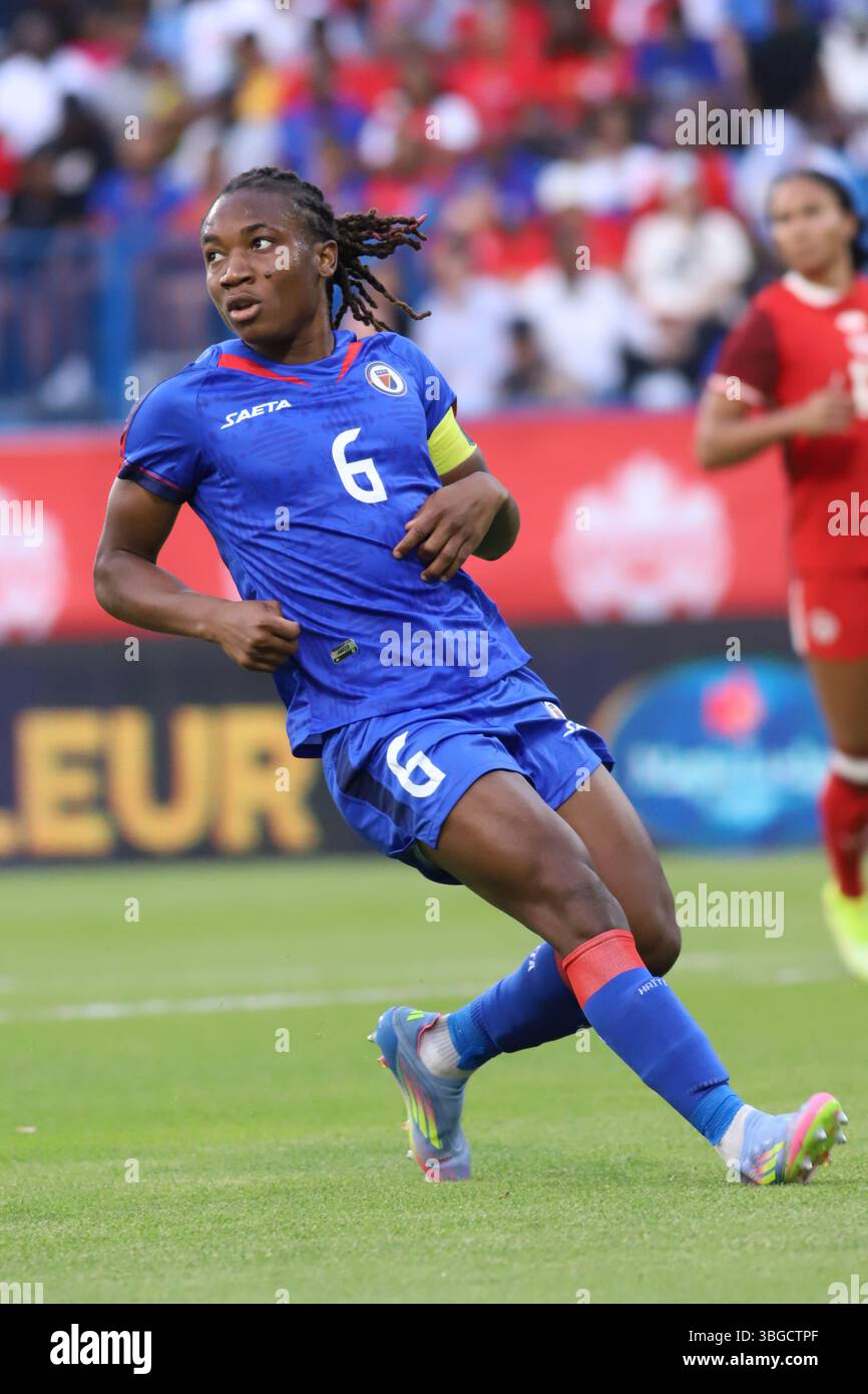 Melchie Dumornay #6 of Haiti runs during the Women's International Friendly match between Canada ...