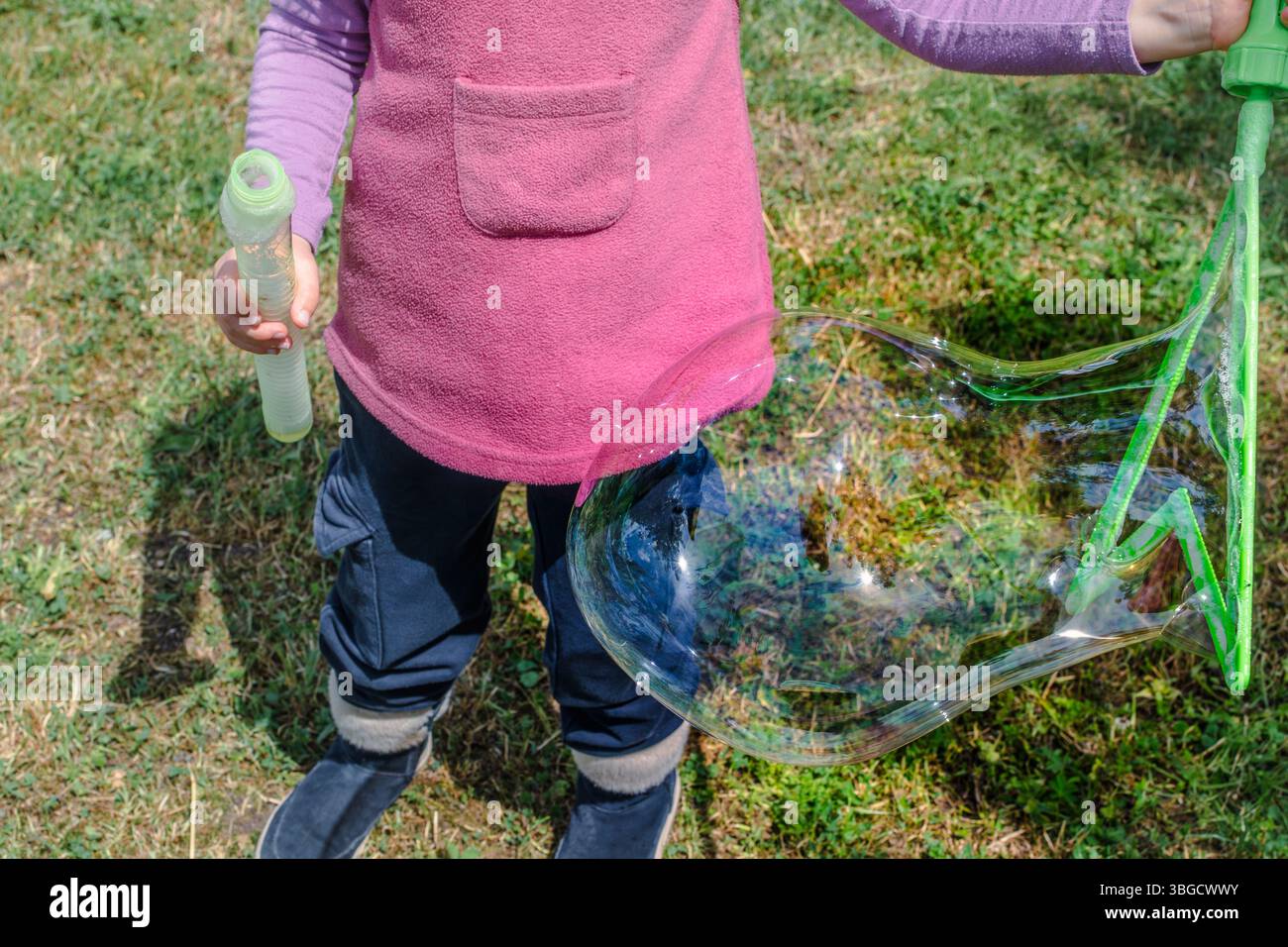 Soap bubble, outdoors activity and leisure for happy kid, real life ...