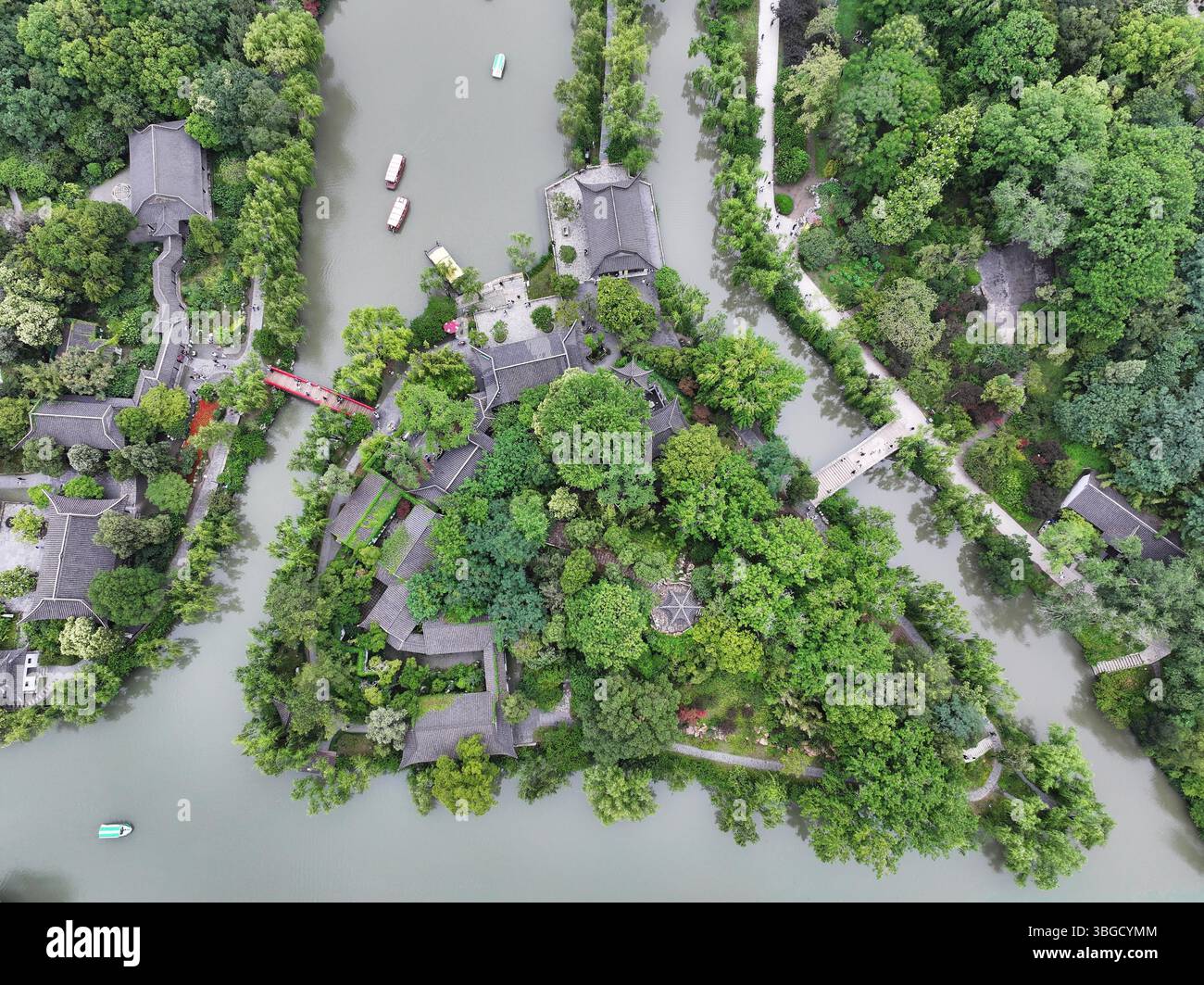 Aerial photo shows tourists visiting the Slender West Lake scenic area ...
