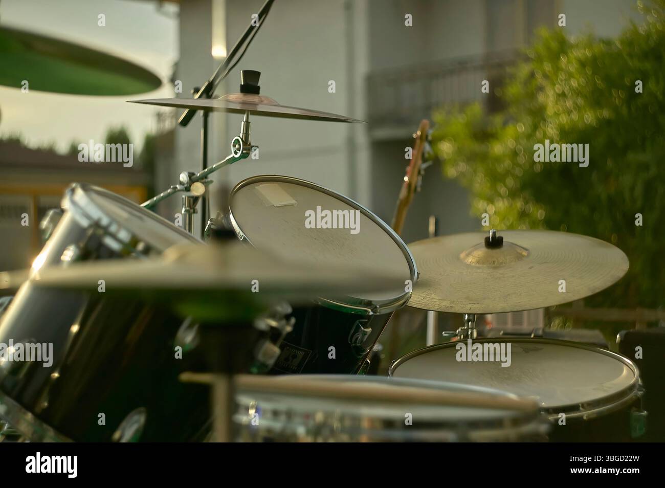 Drum set ready for a live concert, with cymbals, drums and microphone ...