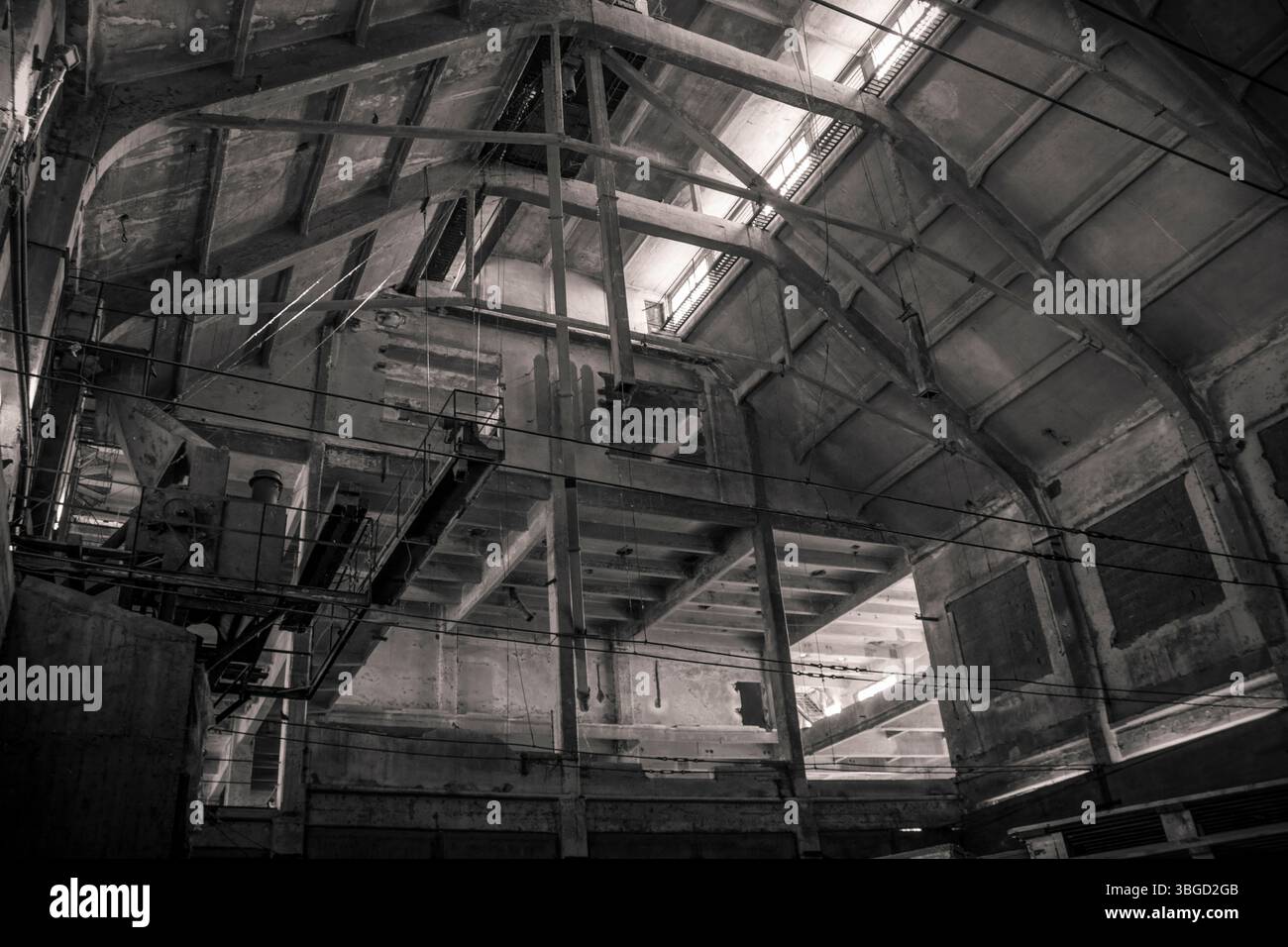 Low angle view of decaying concrete structures inside an abandoned ...