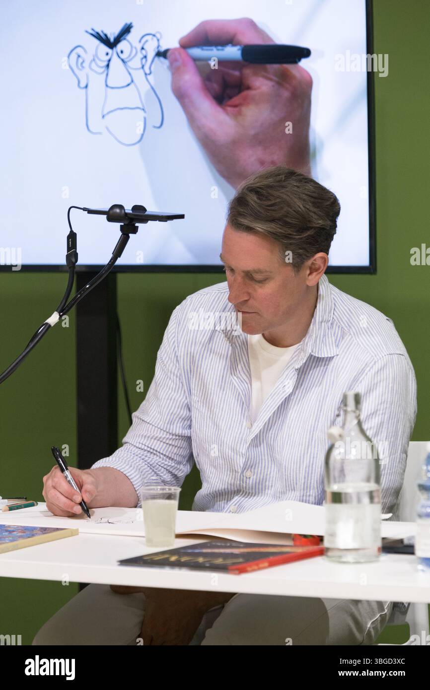 Turin, Italy. 16th May 2025. Illustrator Sam Usher drawing lesson at ...