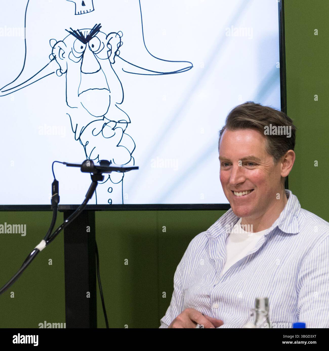 Turin, Italy. 16th May 2025. Illustrator Sam Usher drawing lesson at ...