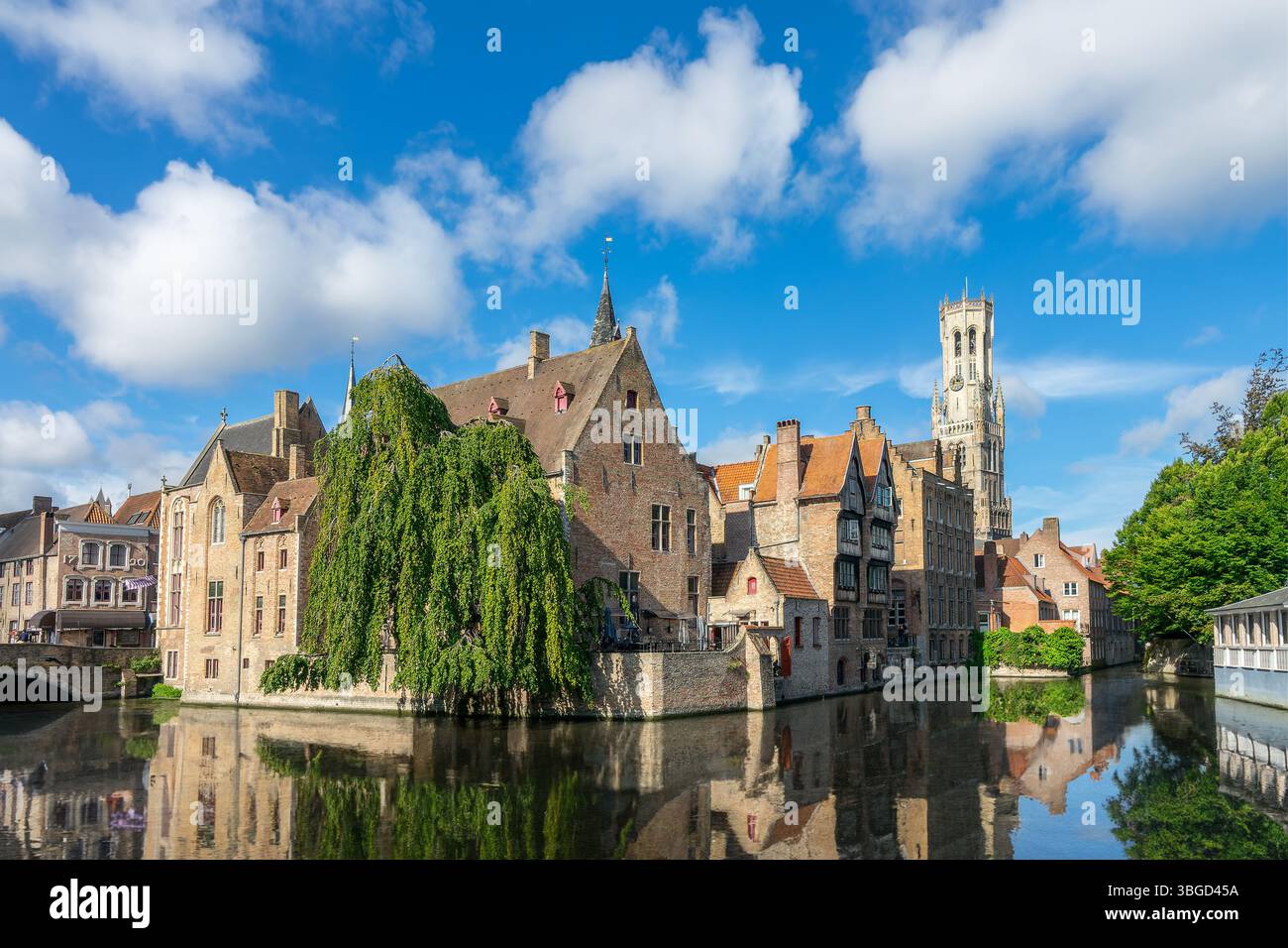 Famous view from Rosary Quay of Bruges, water reflections in the canal ...